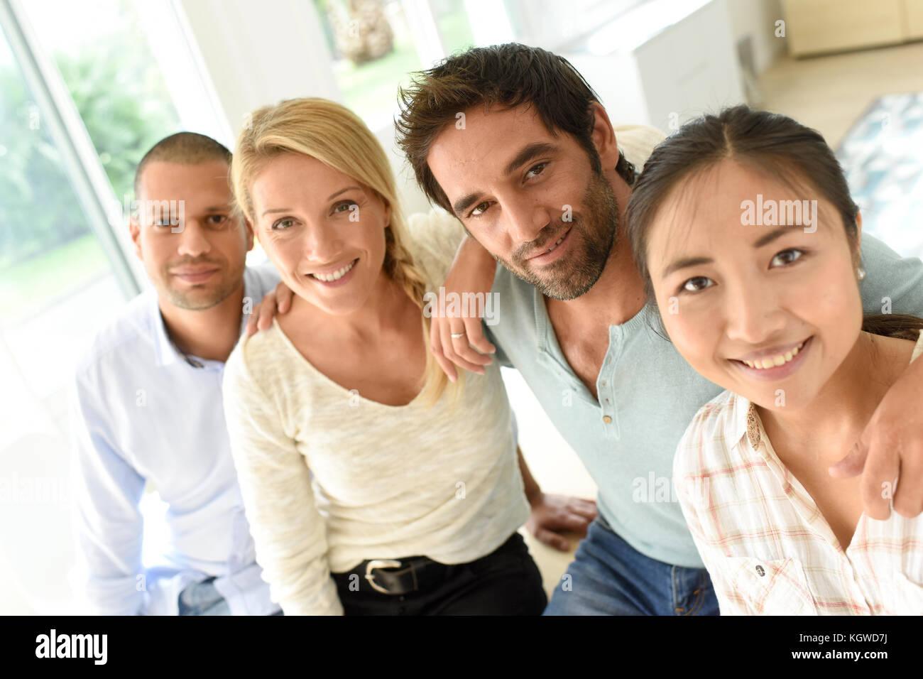 Group of ethnic people having fun together Stock Photo - Alamy