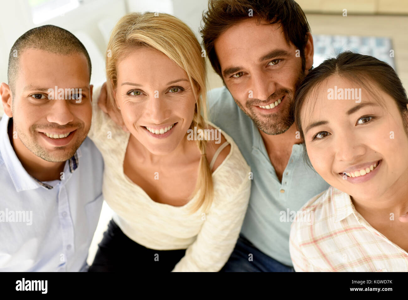 Group of ethnic people having fun together Stock Photo - Alamy