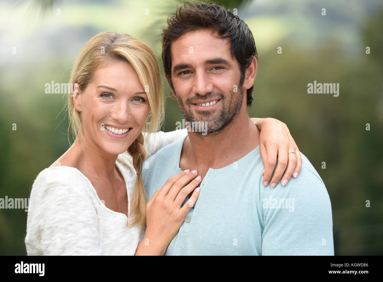Attractive couple embracing each other Stock Photo - Alamy