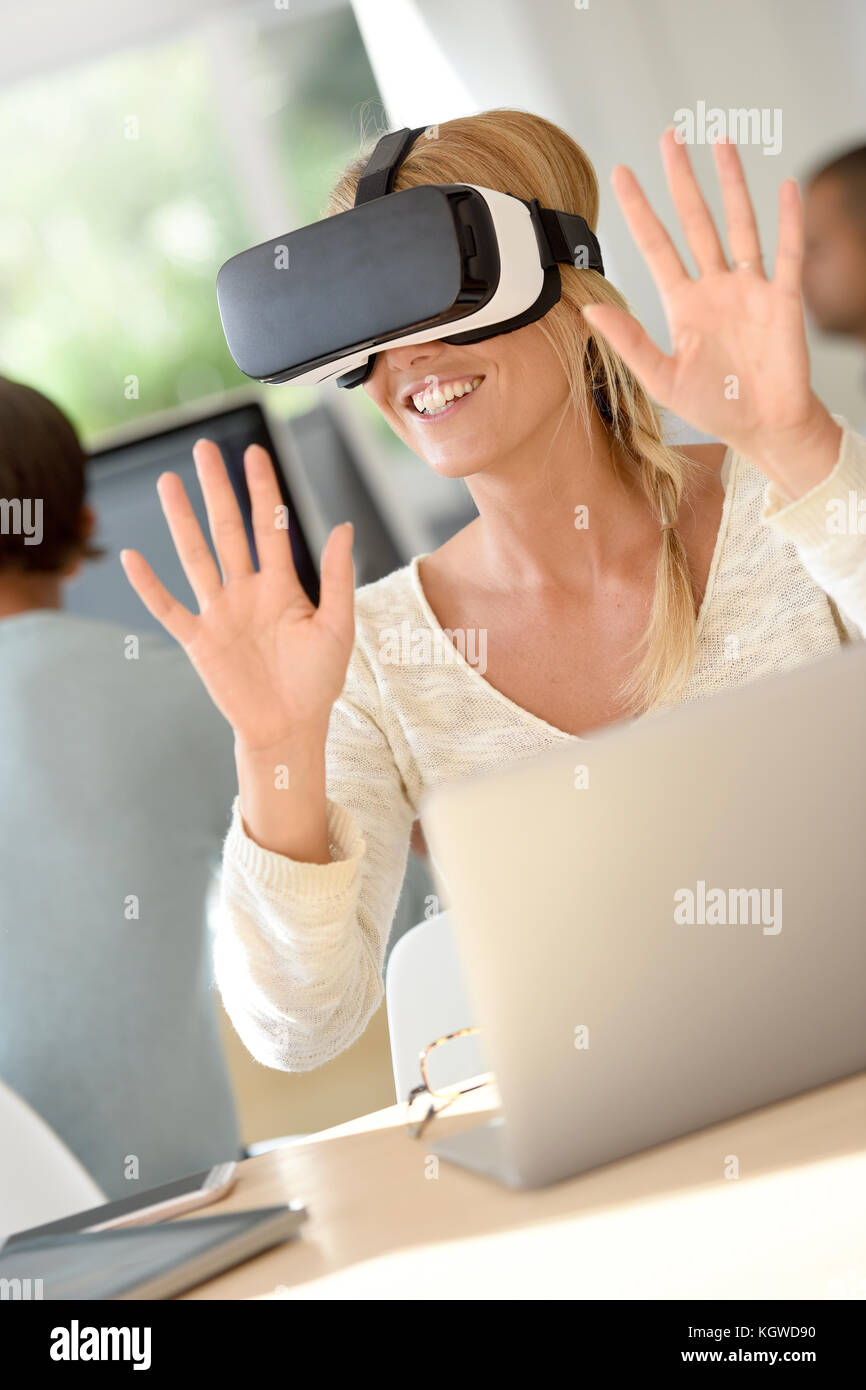 Office-worker using VR headset, 3D, virtual reality Stock Photo - Alamy