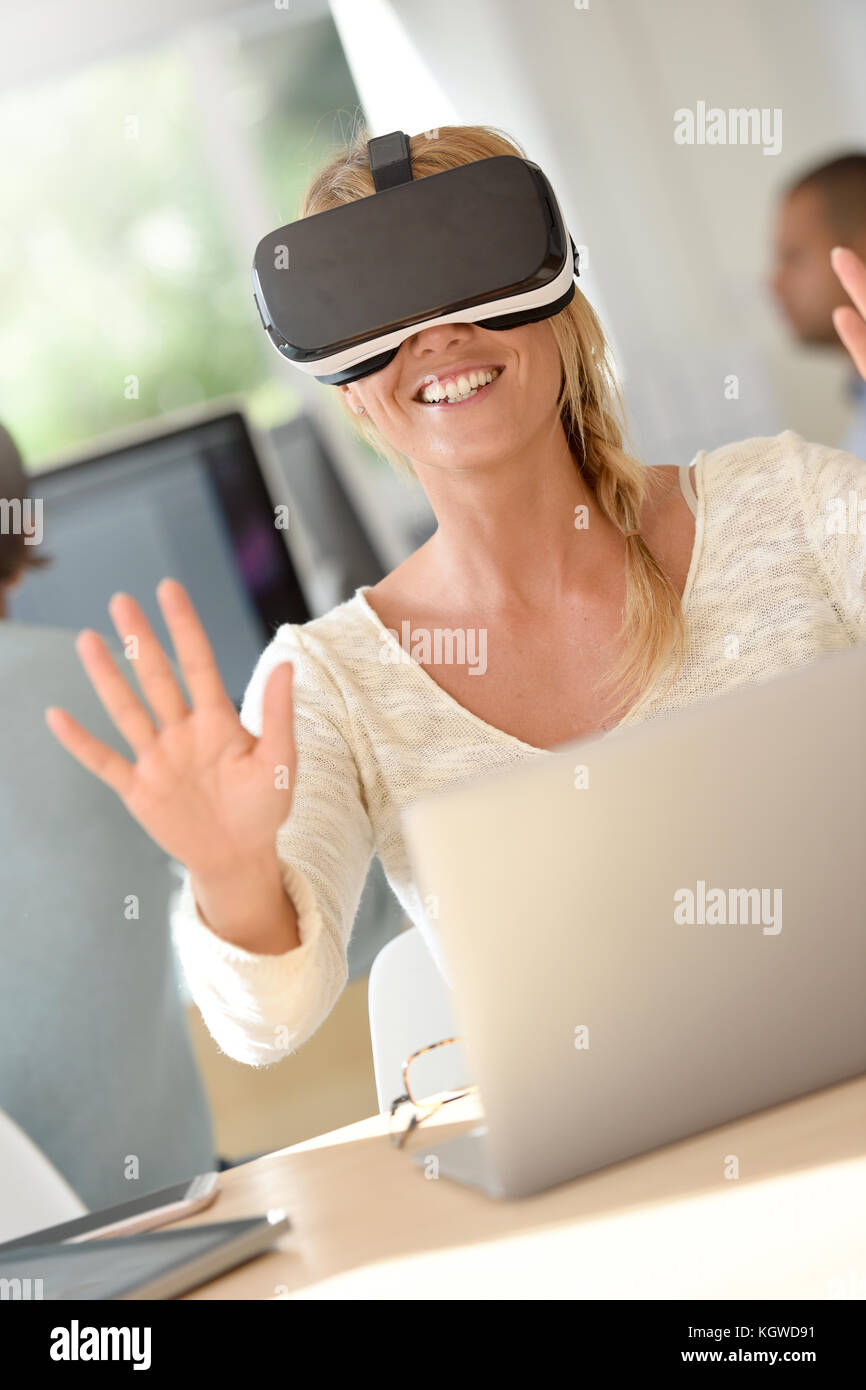 Office-worker using VR headset, 3D, virtual reality Stock Photo - Alamy