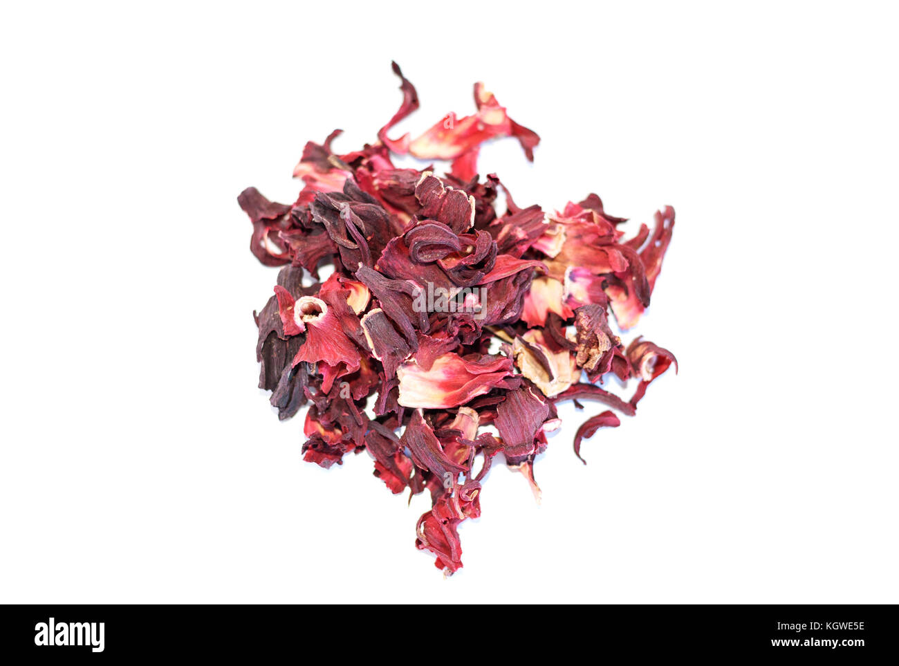 Pile of dried pomegranate flower tea. Isolated on white background ...