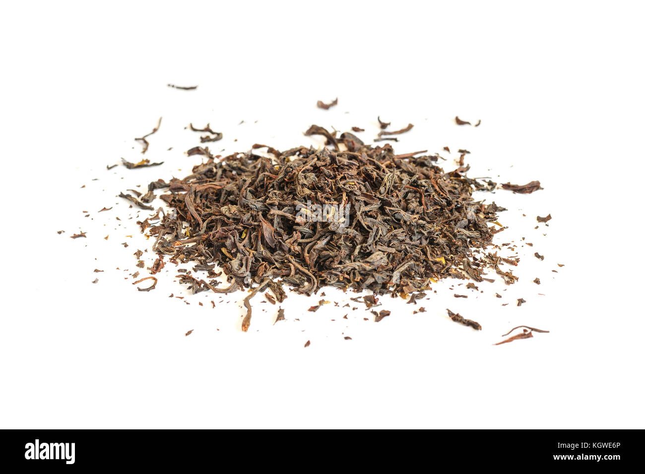 Pile of Indian dry black tea. Isolated on white background selective ...