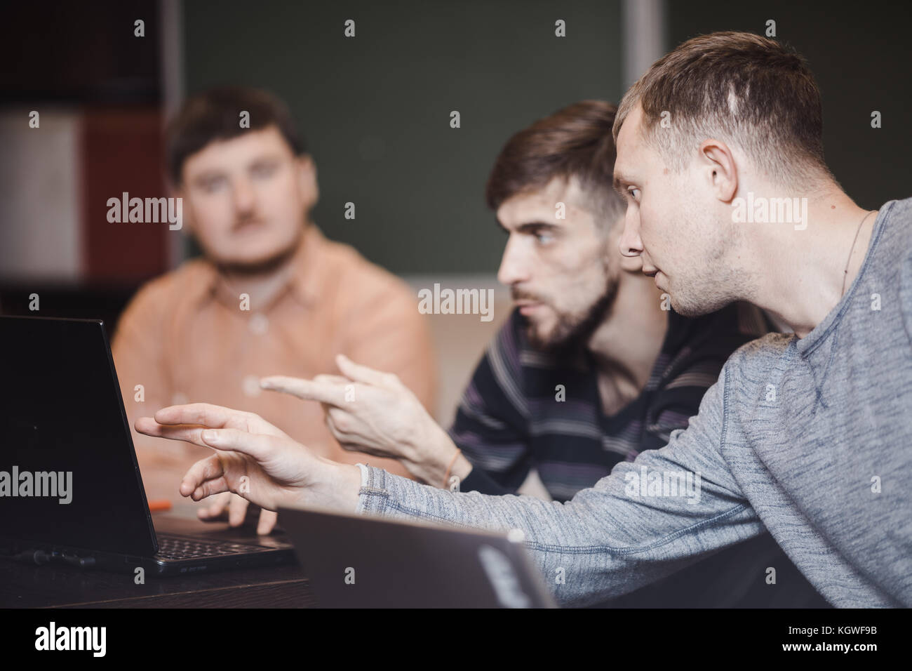 People in classroom using laptops Stock Photo - Alamy