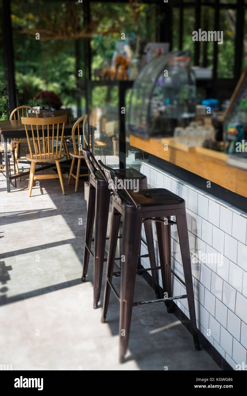 Village cafe with metal counter bar chairs, stock photo Stock Photo - Alamy