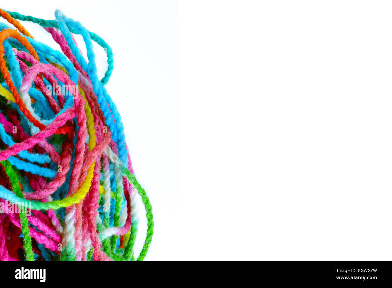 tangled yarn, tangled colorful sewing threads on white background with ...