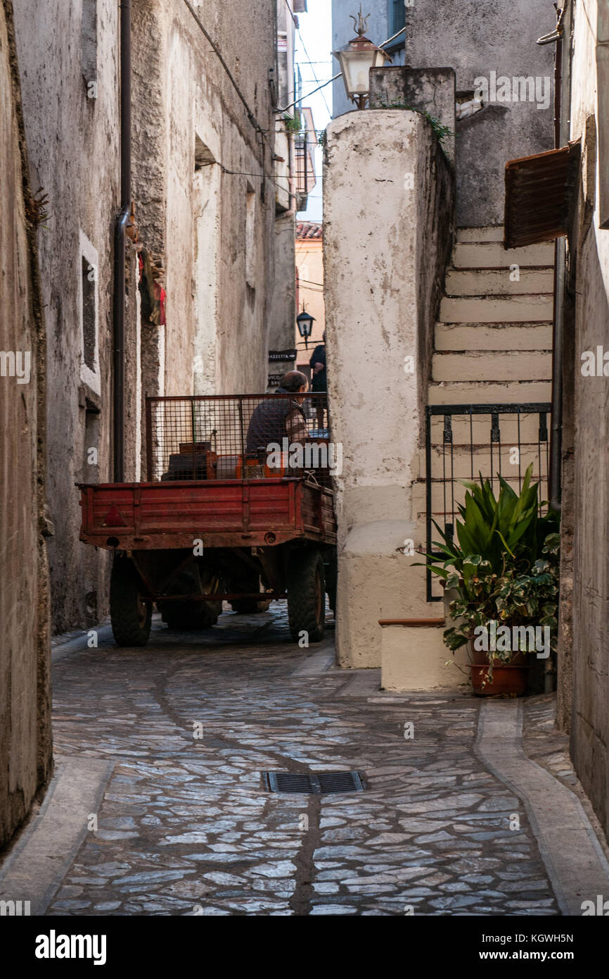 A tractor runs in the streets of the village of Aieta, Italy. Aieta ...