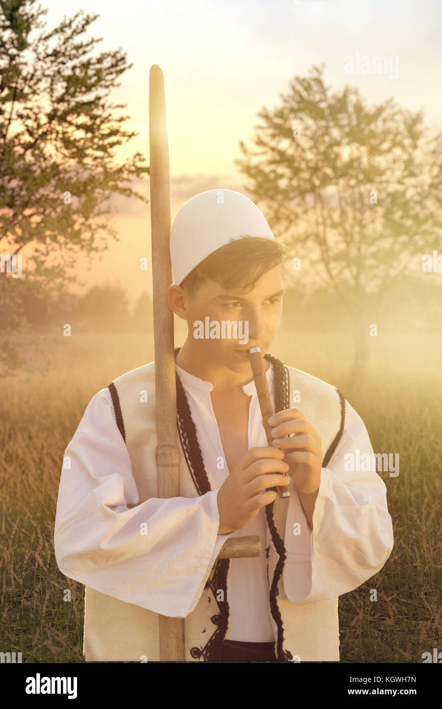 Old man playing flute hi-res stock photography and images - Alamy