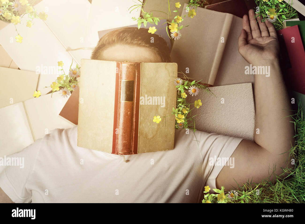 Man sleeping book on face hi-res stock photography and images - Alamy