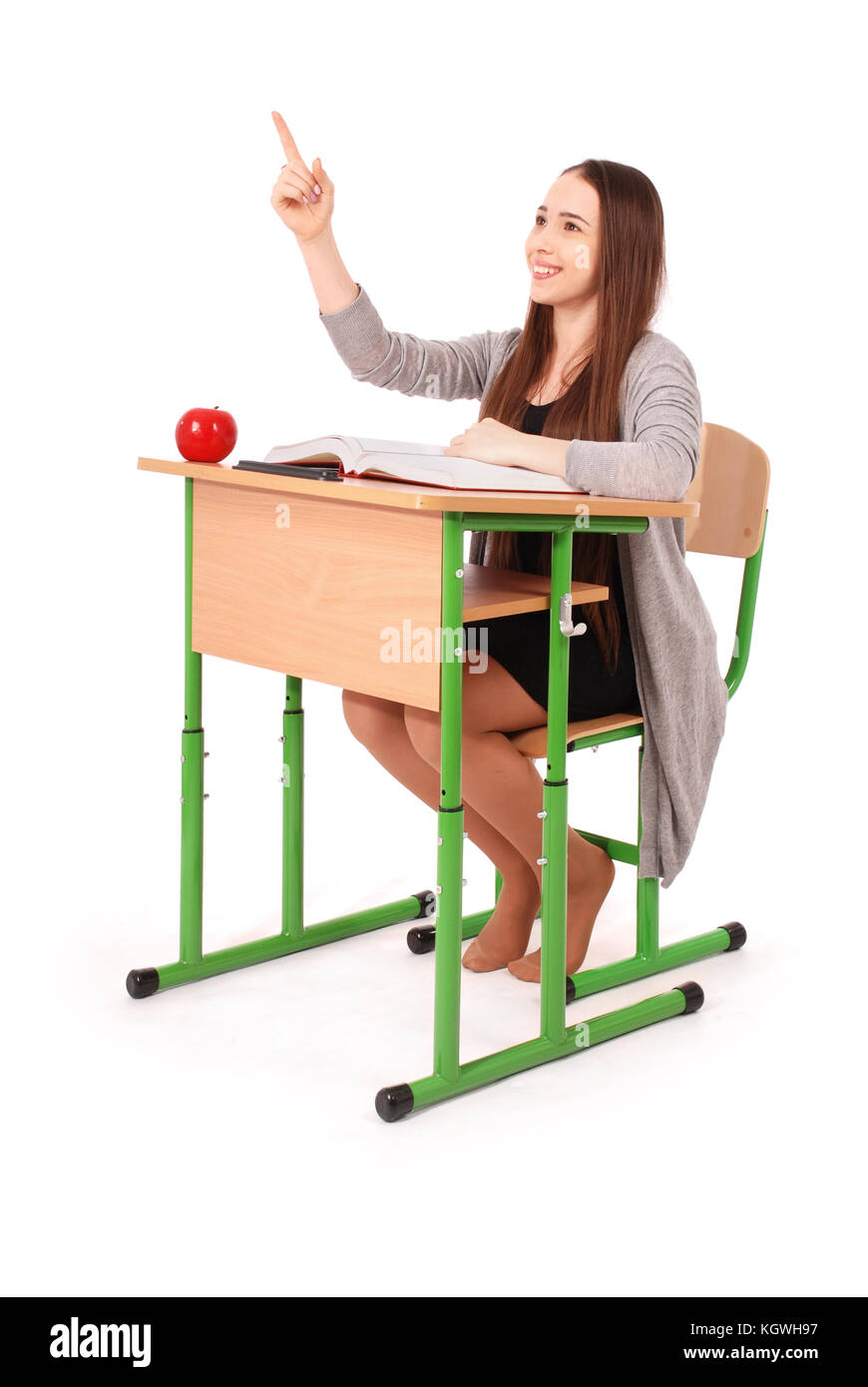 Teenager school girl raising hand to ask question isolated on white ...