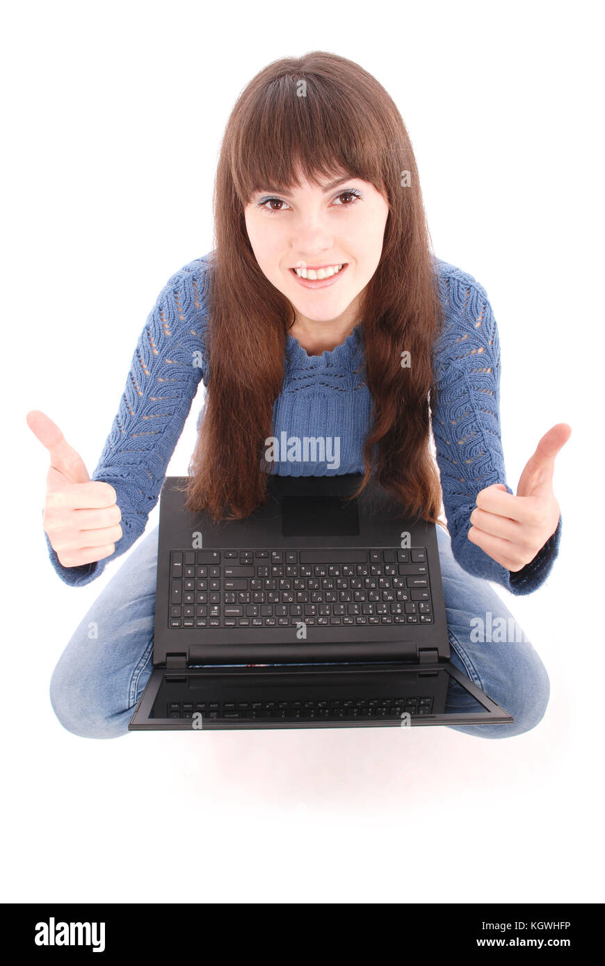 Laptop girl happy giving thumbs up success sign sitting at computer PC ...