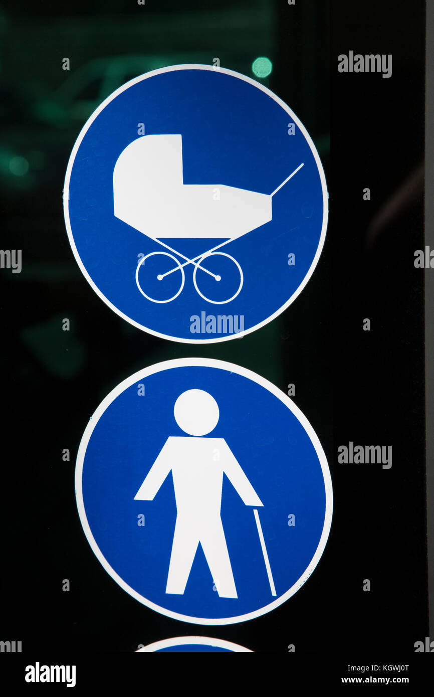 Elderly and Baby Signs on Public Transport Stock Photo - Alamy