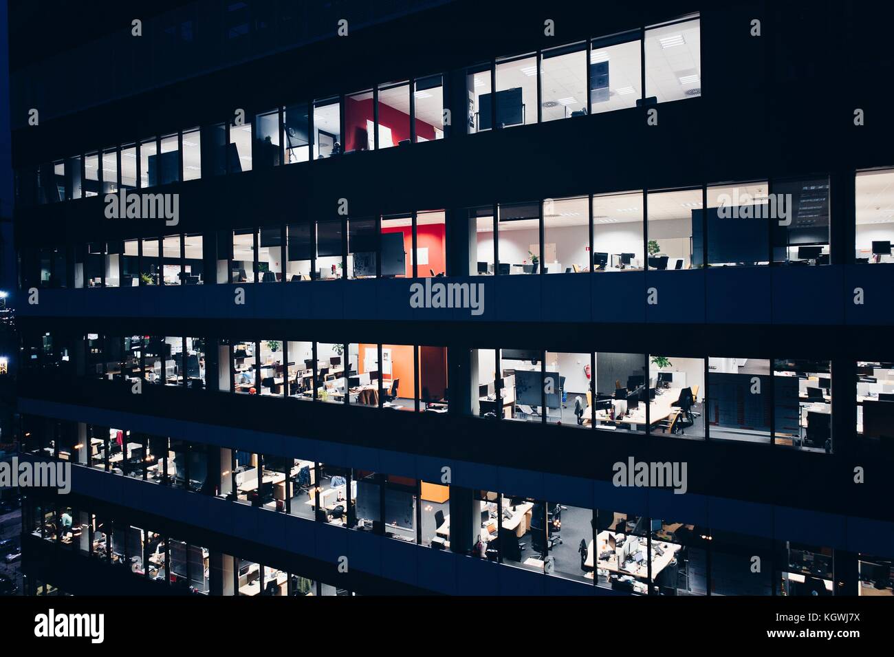 Office building at night. Late night overtime Stock Photo - Alamy