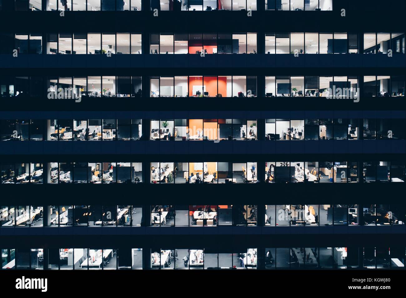 Office building at night. Late night overtime Stock Photo - Alamy