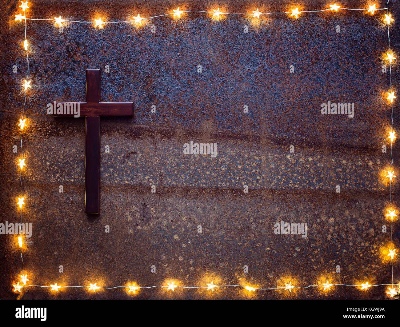 Wooden crucifix on rusty iron background with lights Stock Photo - Alamy