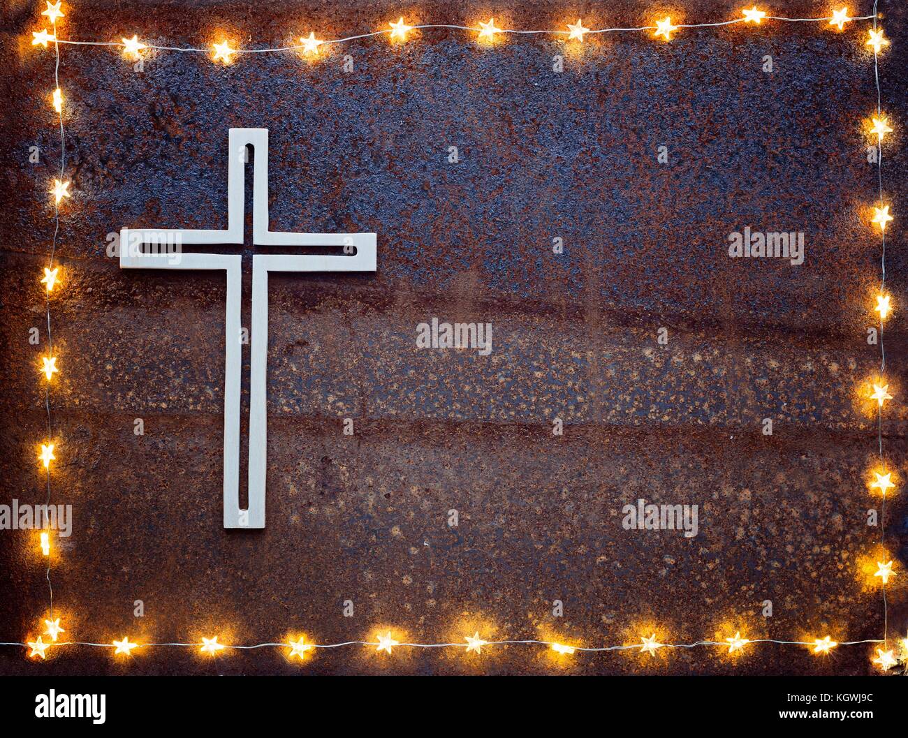 Wooden crucifix on rusty iron background with lights Stock Photo - Alamy