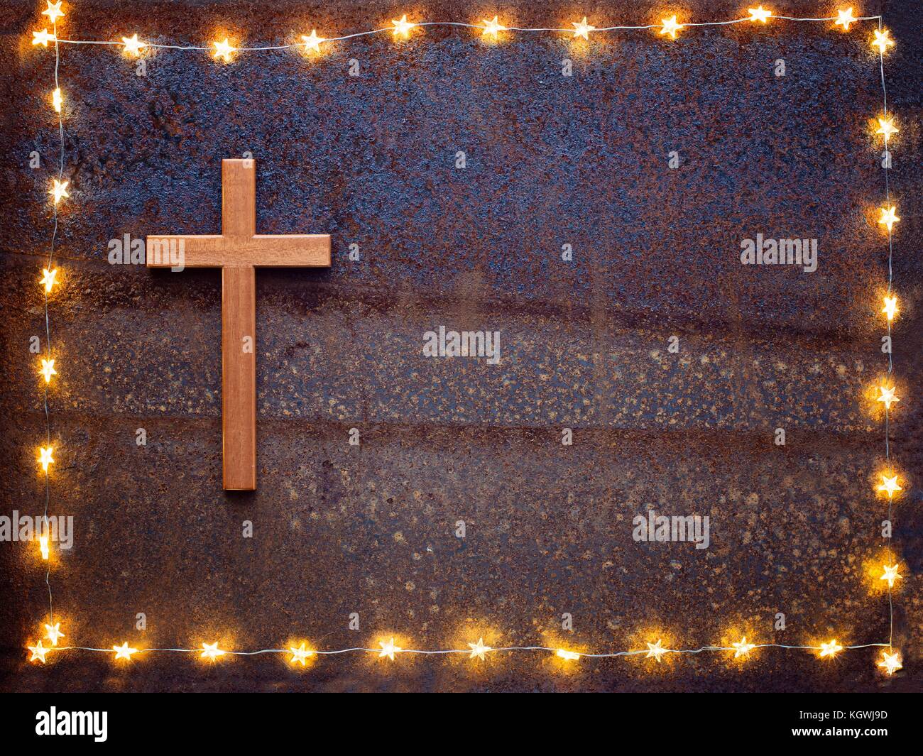 Wooden crucifix on rusty iron background with lights Stock Photo - Alamy