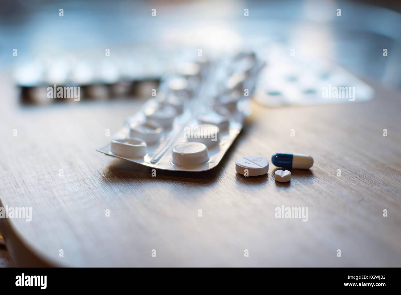 Medication tablets set out ready to be taken. Blister pack tablet ...