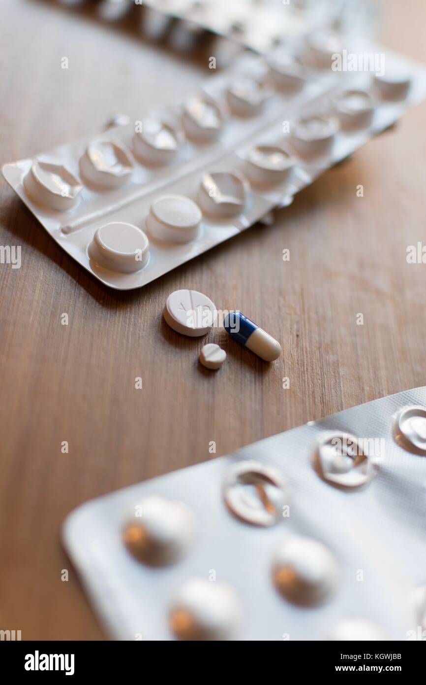 Medication tablets set out ready to be taken. Blister pack tablet ...