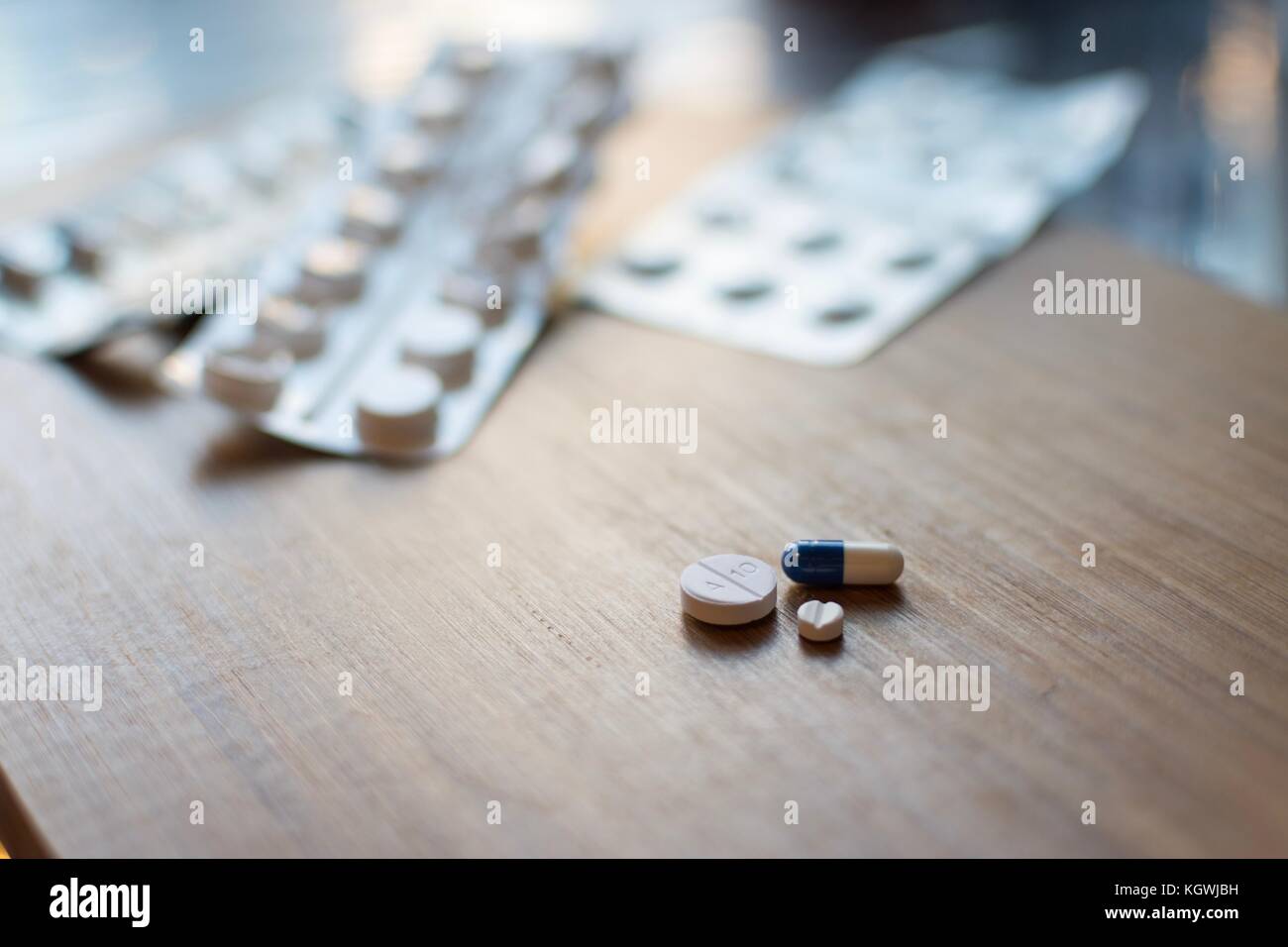 Medication tablets set out ready to be taken. Blister pack tablet ...