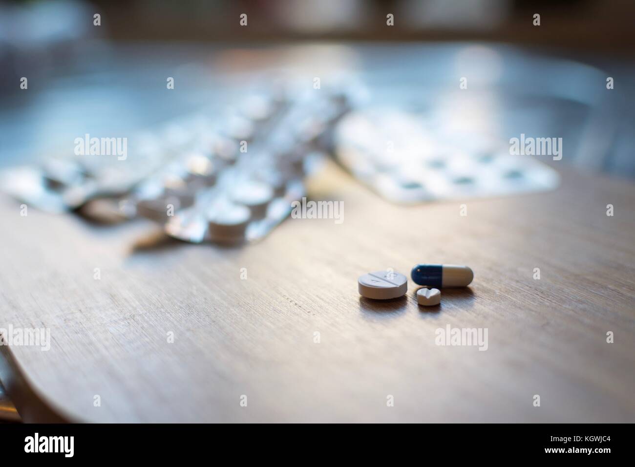 Medication tablets set out ready to be taken. Blister pack tablet ...