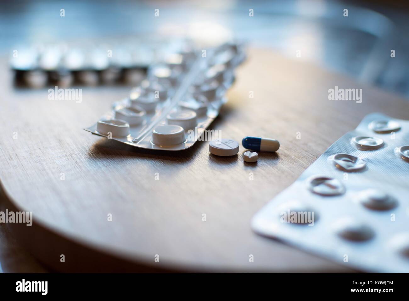 Medication tablets set out ready to be taken. Blister pack tablet ...