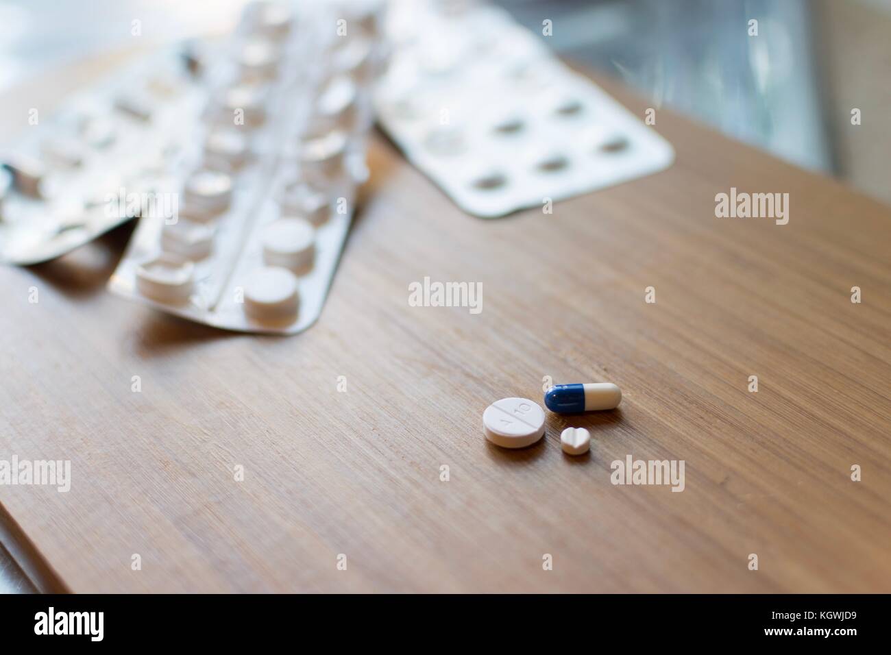 Medication tablets set out ready to be taken. Blister pack tablet ...