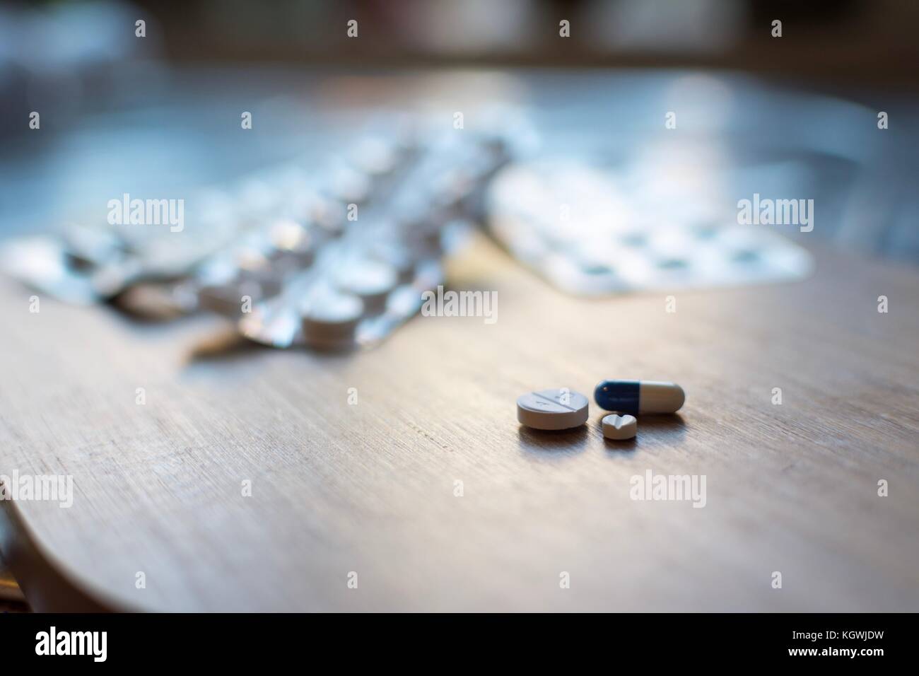 Medication tablets set out ready to be taken. Blister pack tablet ...