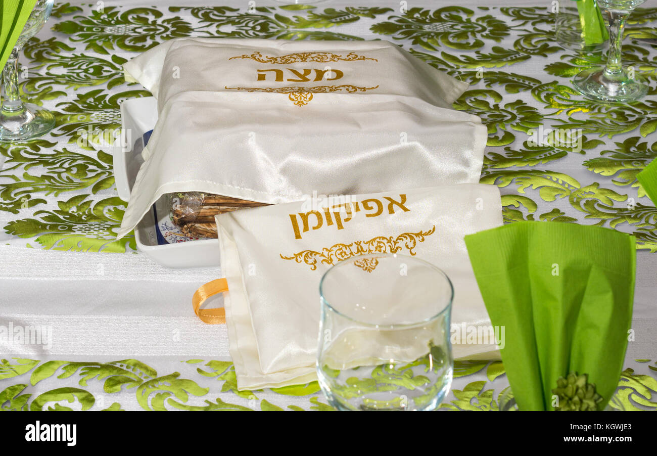 Modern Passover Seder table with green and gold decorations in Tel Aviv ...