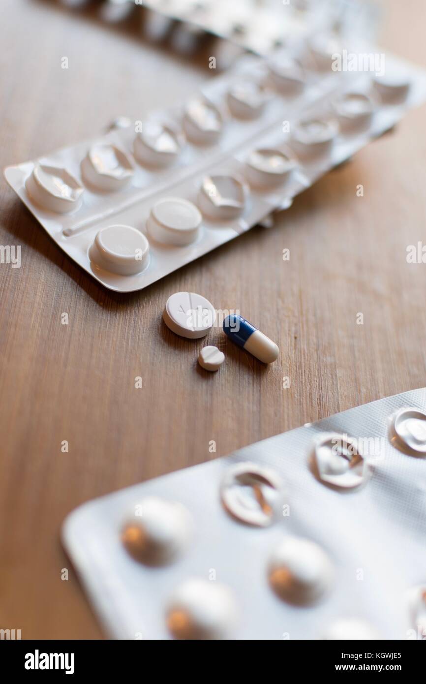 Medication tablets set out ready to be taken. Blister pack tablet ...