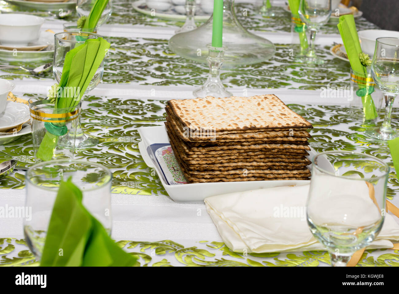 Modern Passover Seder table with green and gold decorations in Tel Aviv ...