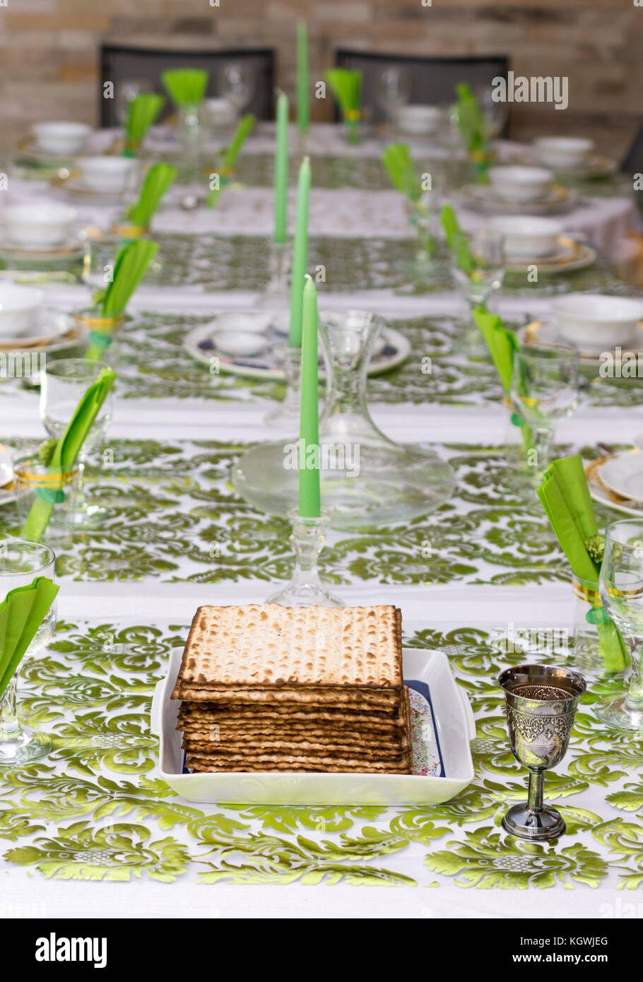 Modern Passover Seder table with green and gold decorations in Tel Aviv ...