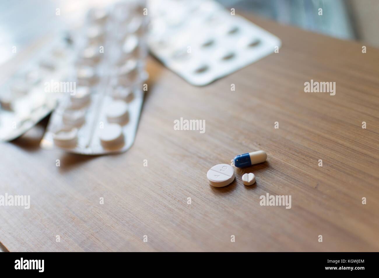 Medication tablets set out ready to be taken. Blister pack tablet ...