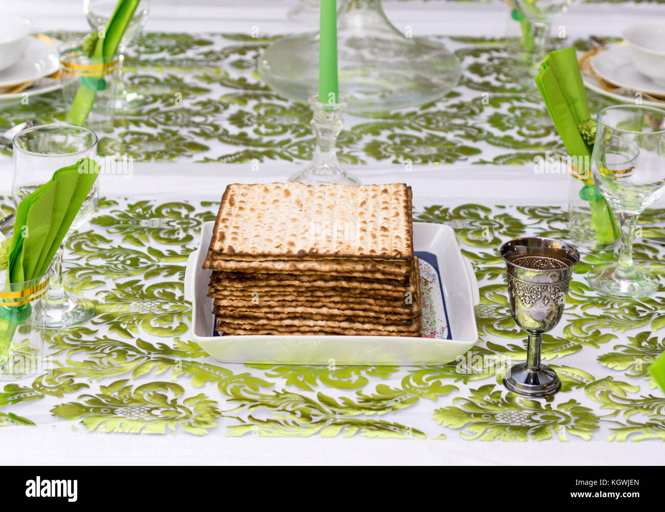 Modern Passover Seder table with green and gold decorations in Tel Aviv ...