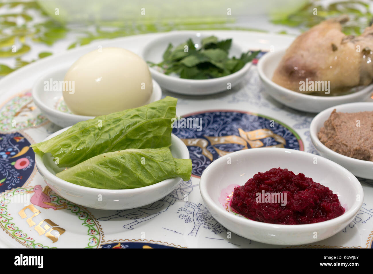 Traditional Passover Seder plate with six items which have significance ...