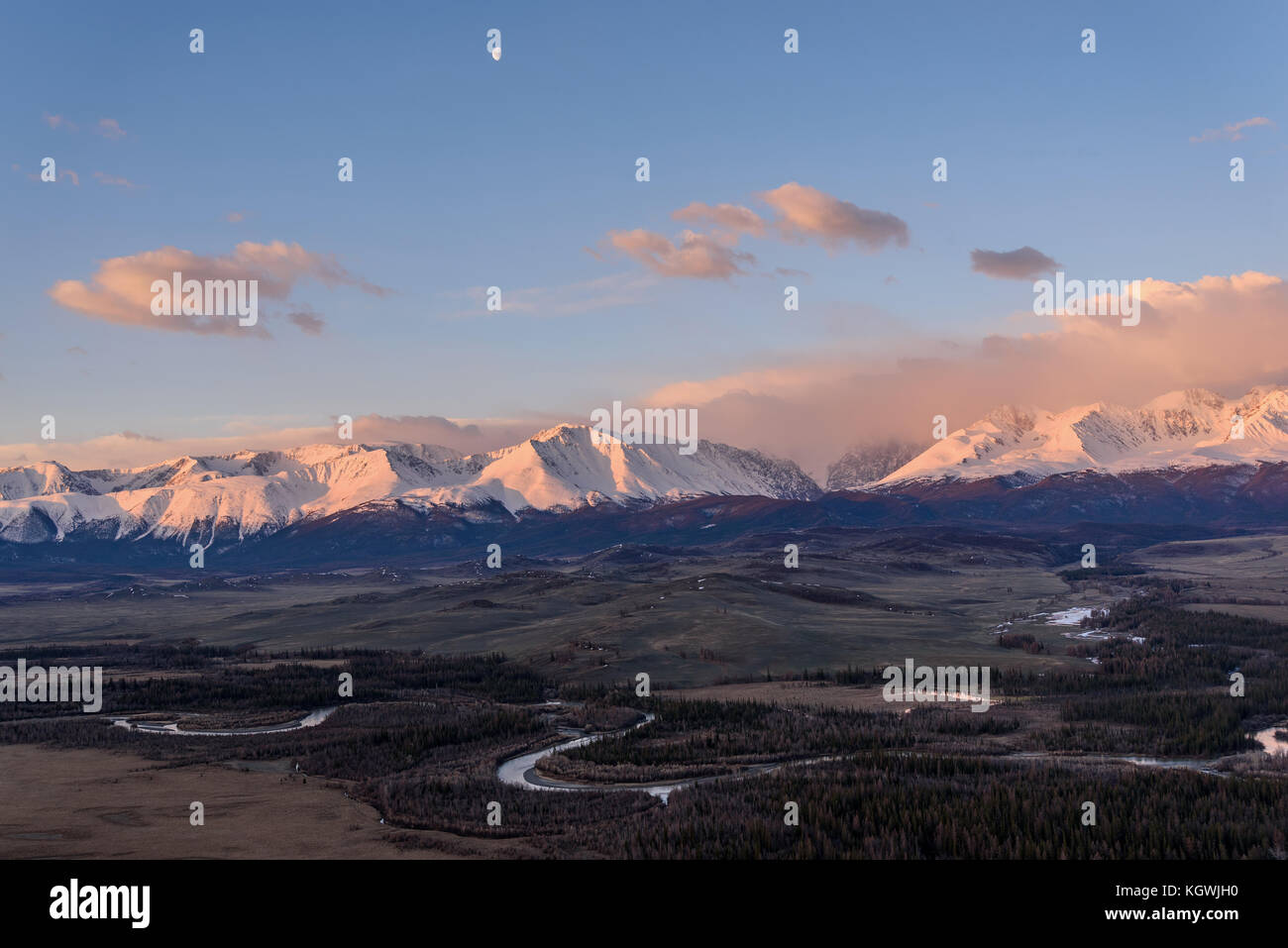 Scenic spring landscape with mountains covered with snow, valley ...