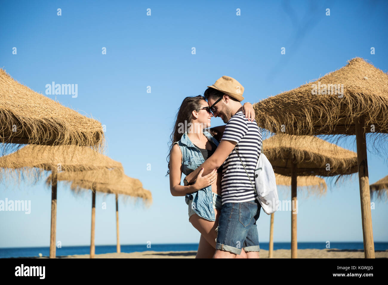 Cuddling on beach hi-res stock photography and images - Alamy
