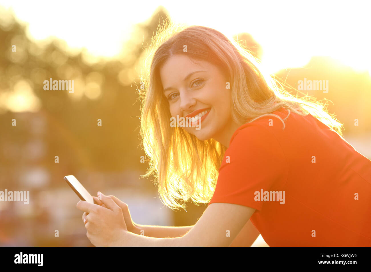 Girl looking back at camera hi-res stock photography and images - Alamy