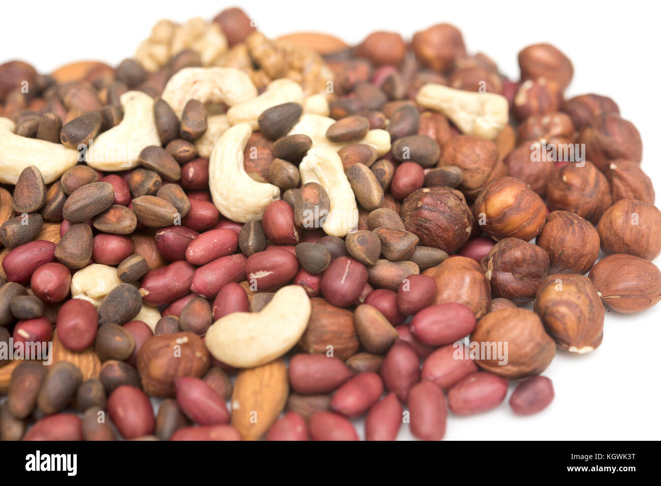 mixed nuts isolated on white background Stock Photo - Alamy
