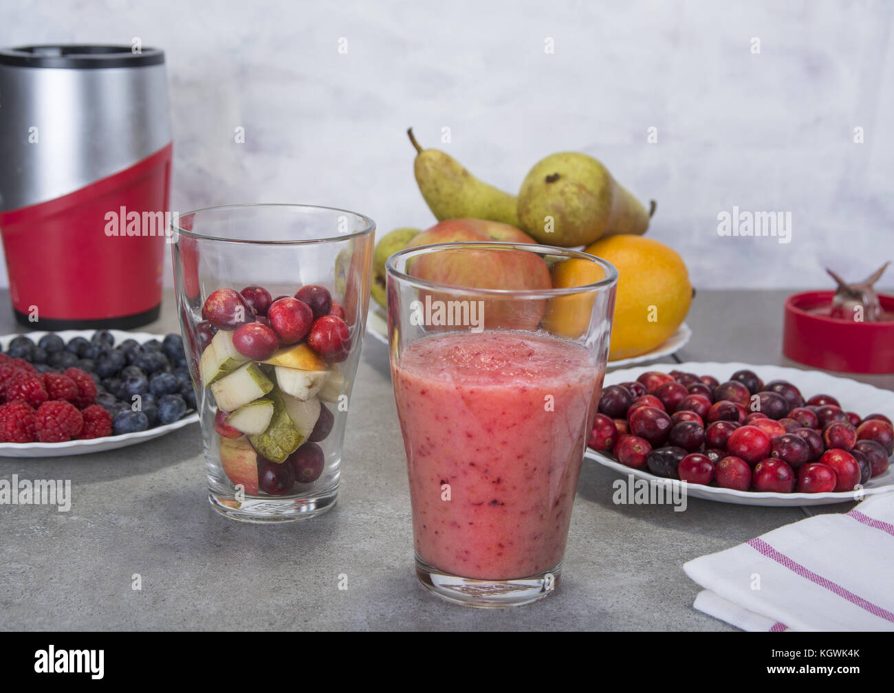 Fruit smoothies with blueberries, raspberries, apple, orange , pear and ...