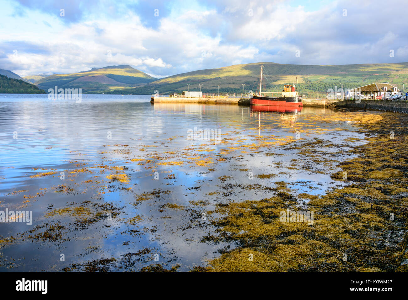 Sunset and boat on Loch Fyfe at Inveraray, in Central Scotland Stock ...