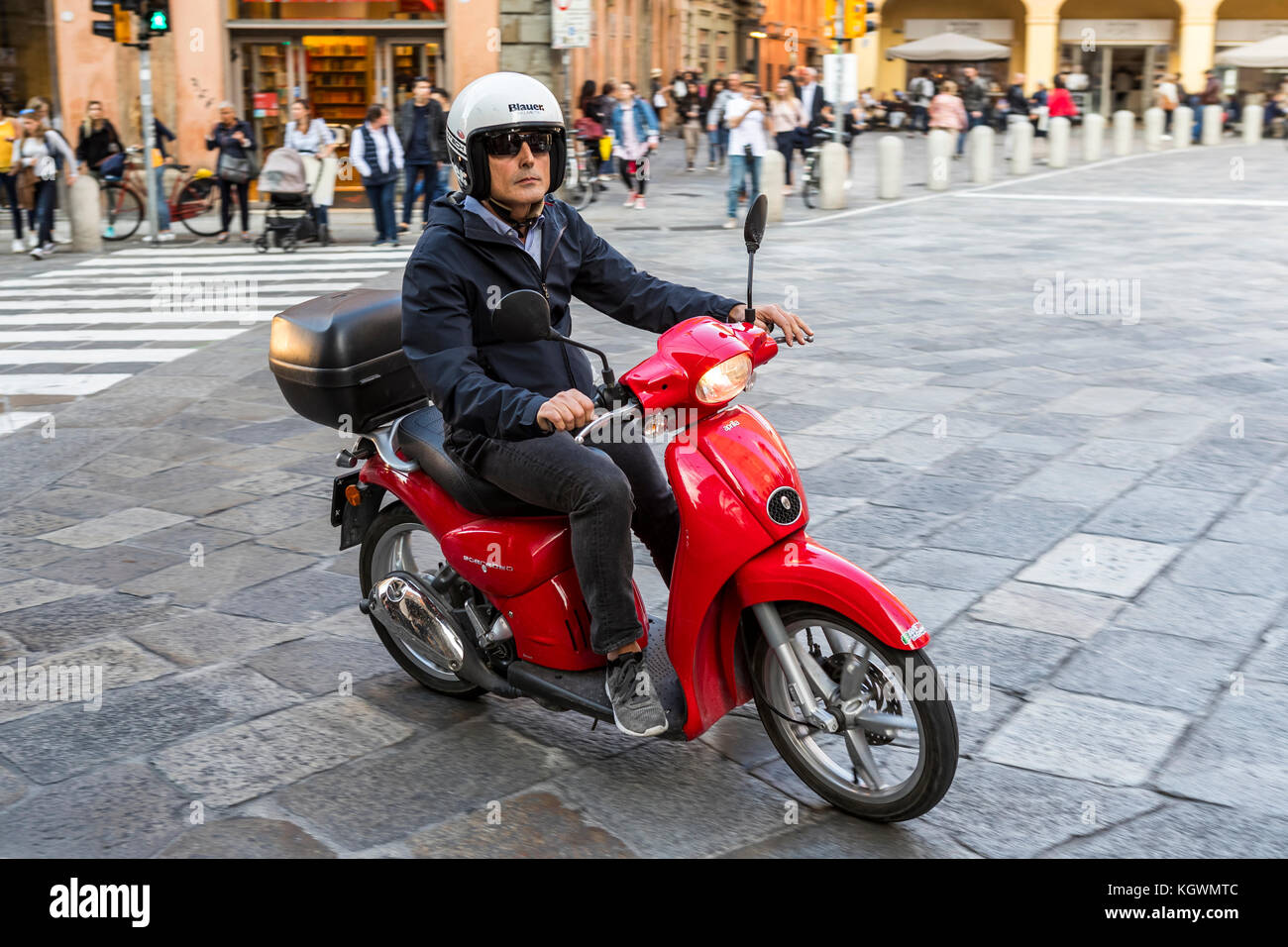 Commuter on red moped hi-res stock photography and images - Alamy