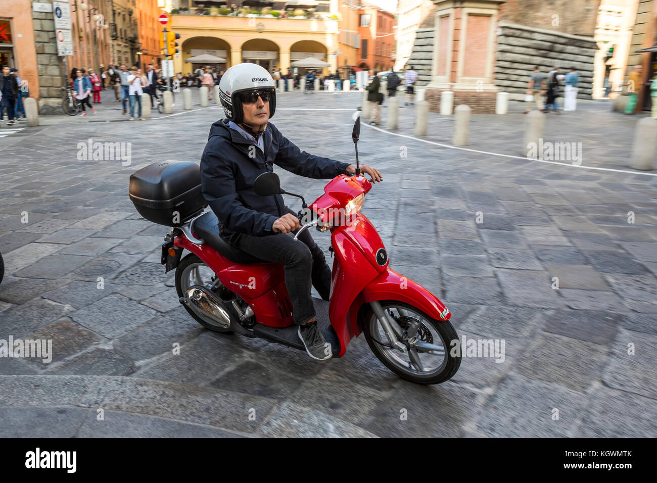 Commuter on red moped hi-res stock photography and images - Alamy
