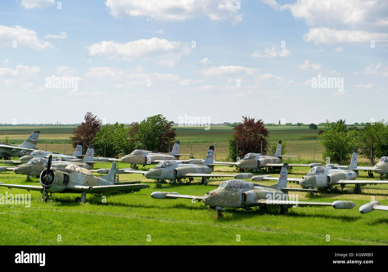 Old military fighter jets in the field Stock Photo - Alamy