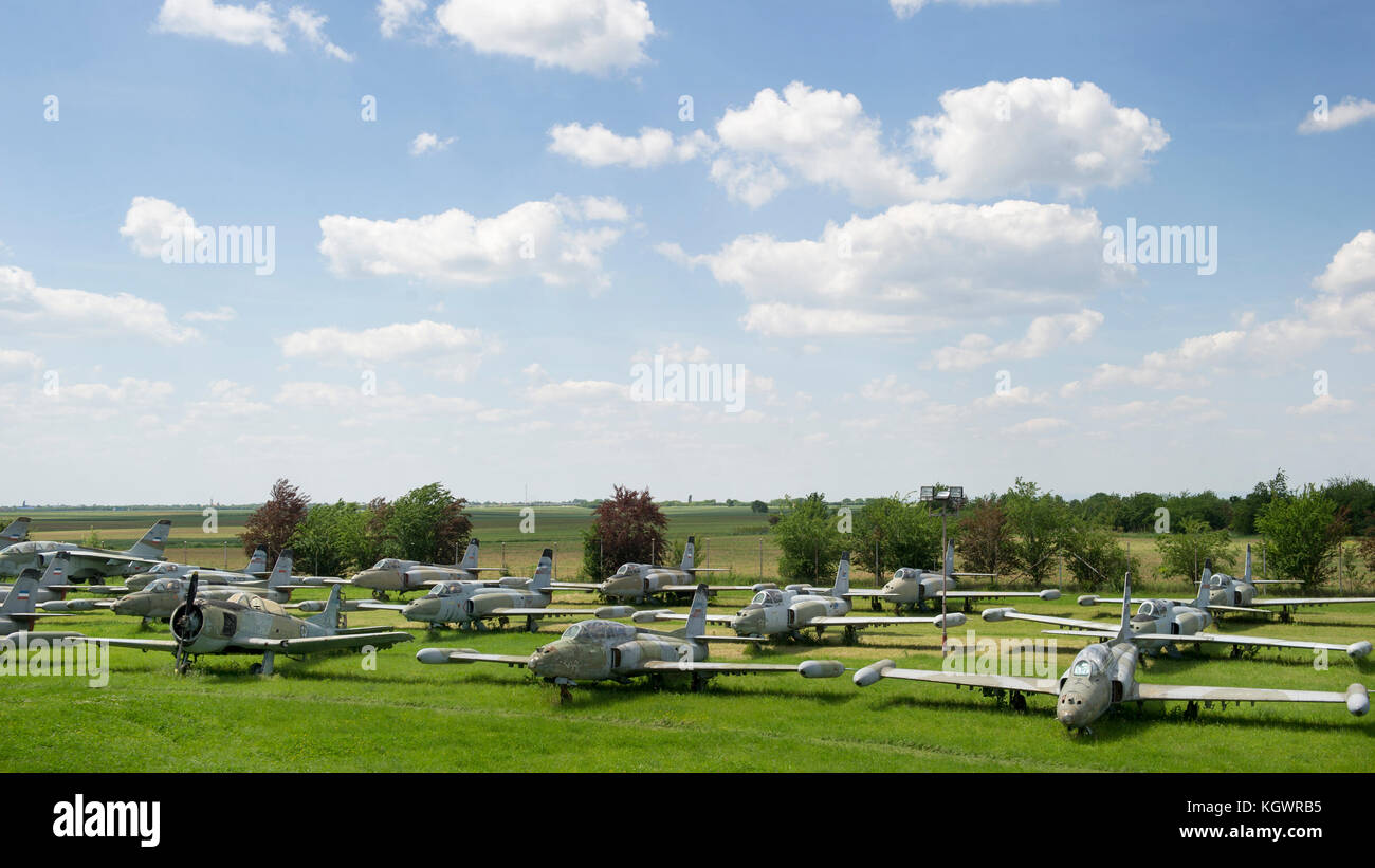Old military fighter jets in the field Stock Photo - Alamy
