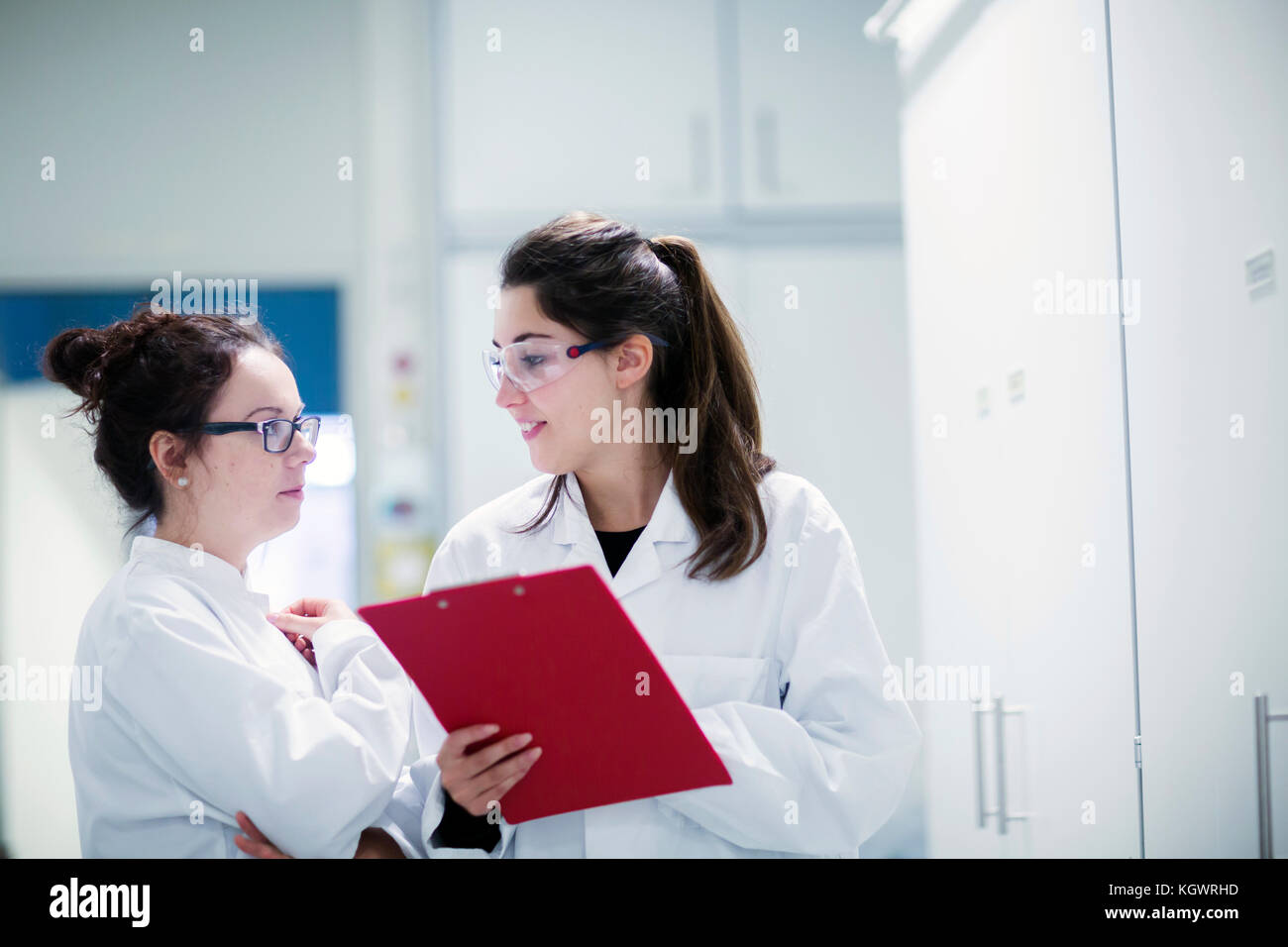 Female scientists working in a laboratory Stock Photo - Alamy