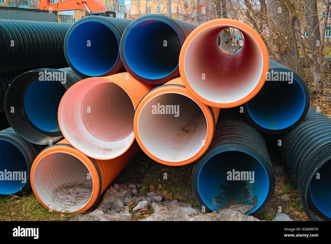 Pipes of PVC large diameter prepared for laying on construction site ...