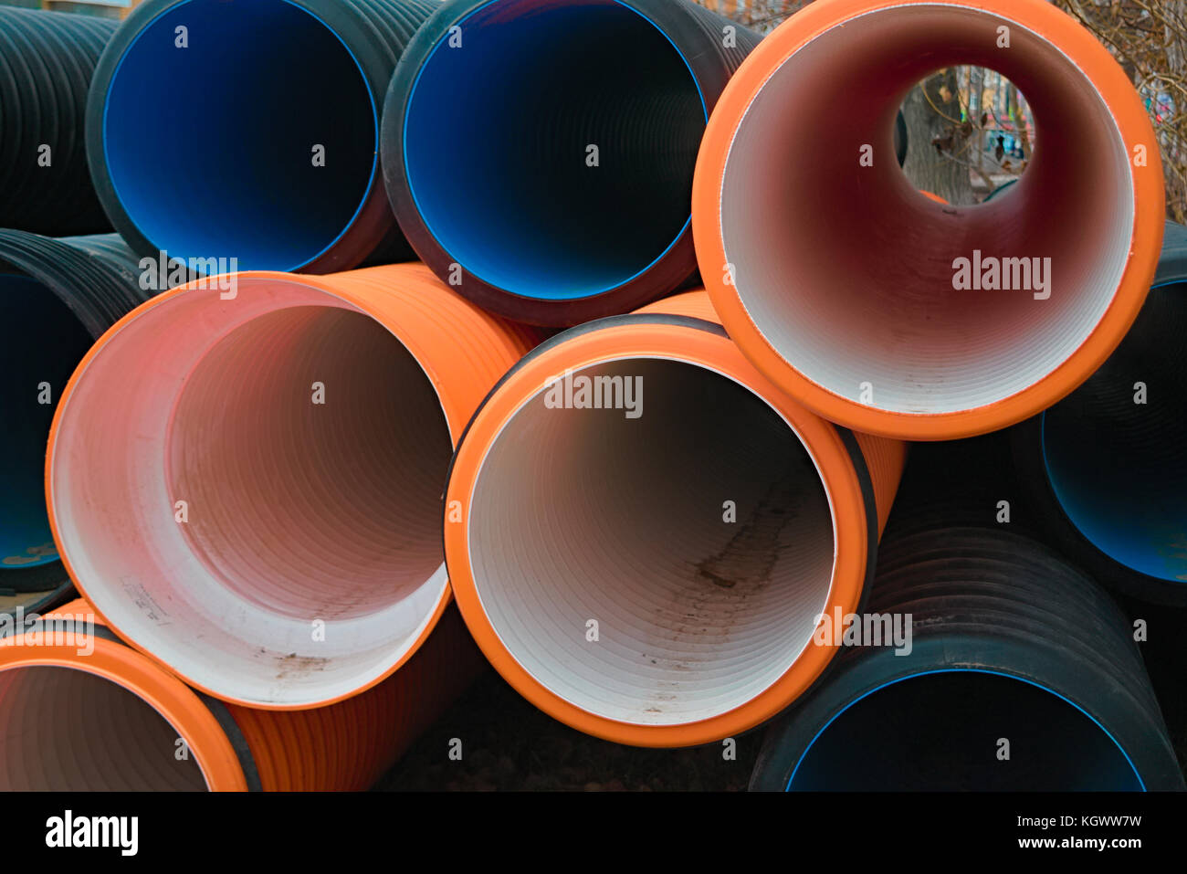 Pipes of PVC large diameter prepared for laying on construction site ...
