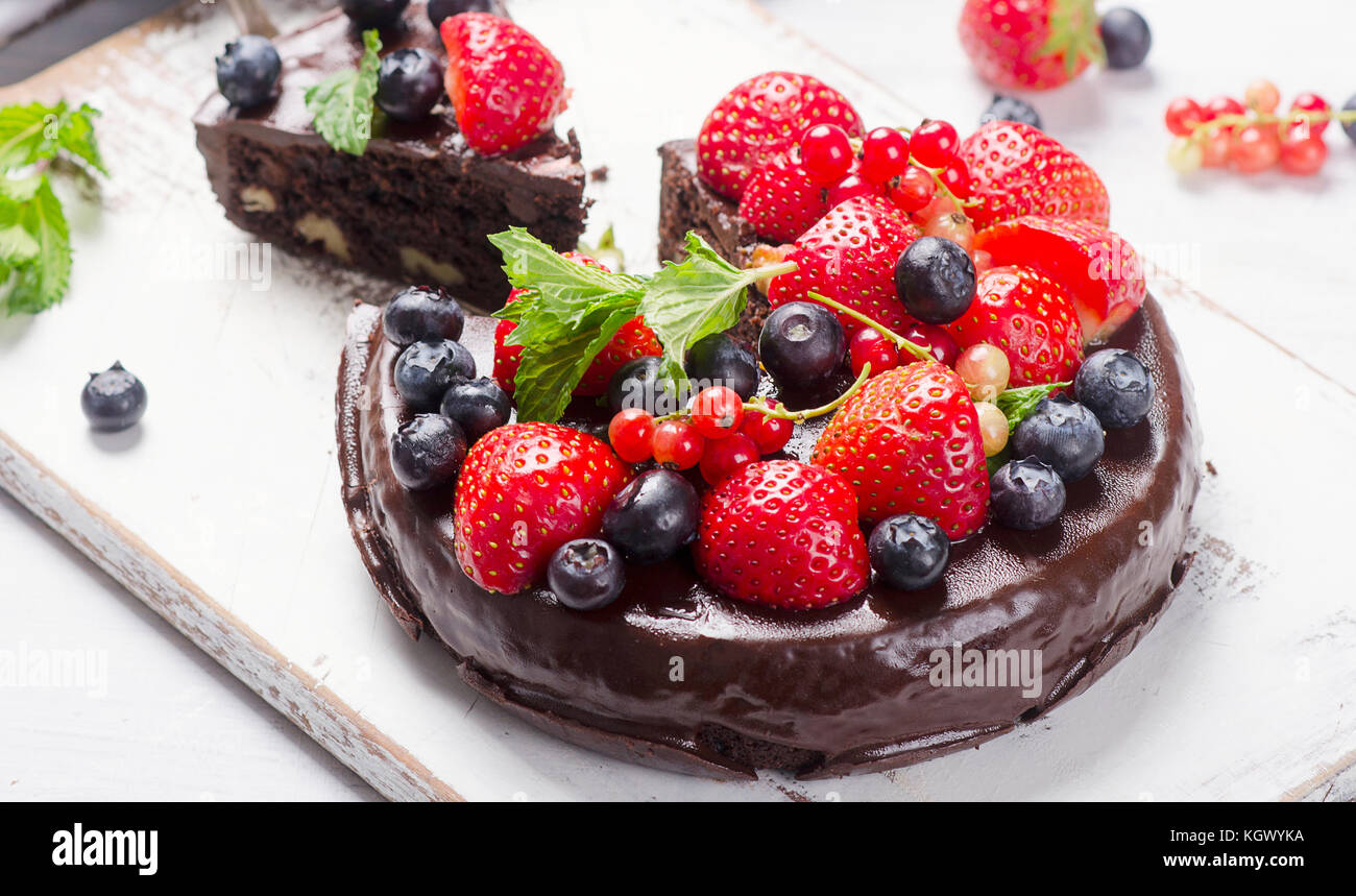 Chocolate cake with fresh different berries Stock Photo - Alamy
