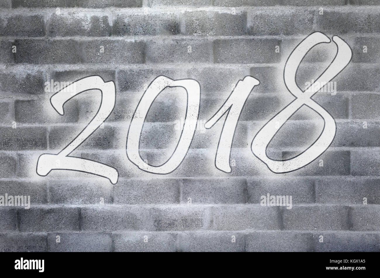 2018 written on cinderblock wall Stock Photo - Alamy